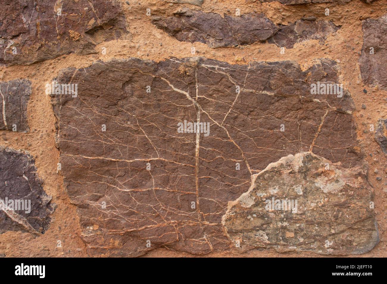 orange pointing used between stone construction of building and ...