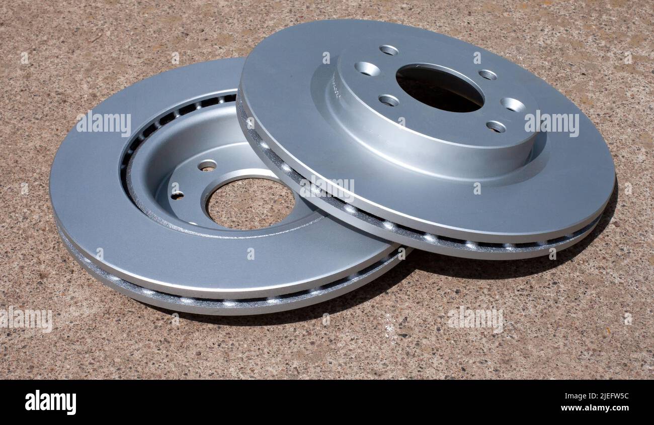 New brake discs for car repair Stock Photo - Alamy