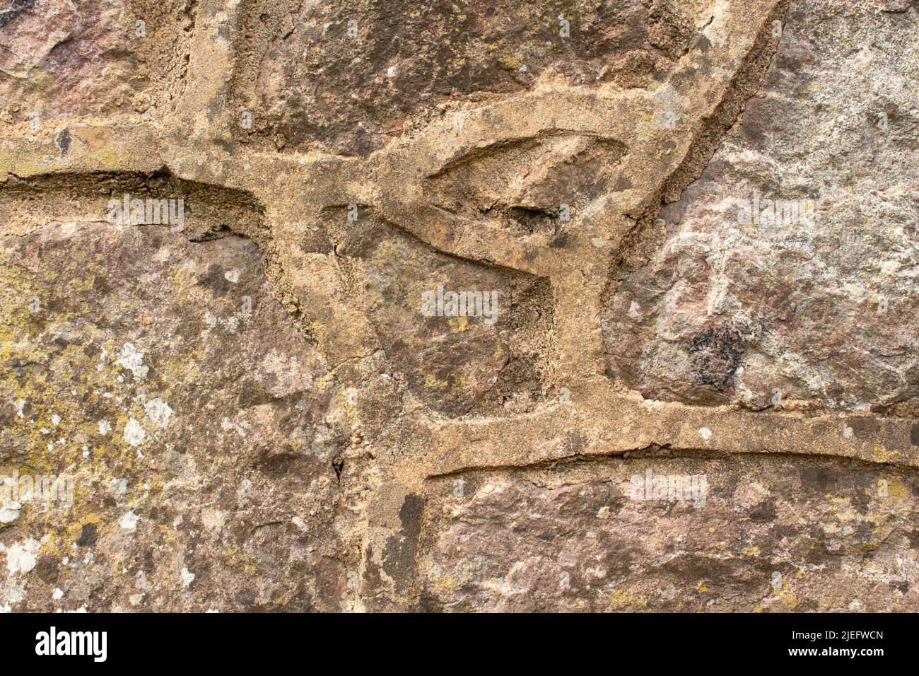 pale rock coloured raised pointing used between stone construction of ...