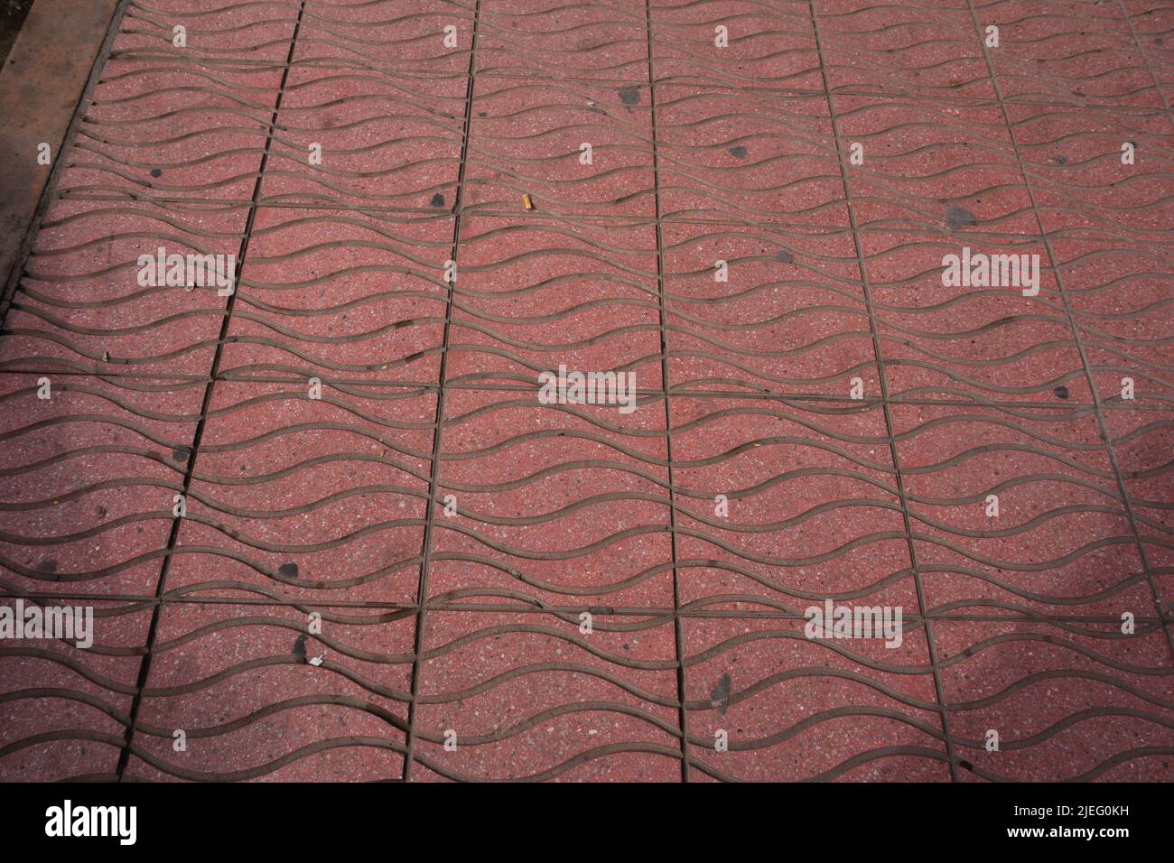 textured floor tile with wavy lines Stock Photo - Alamy