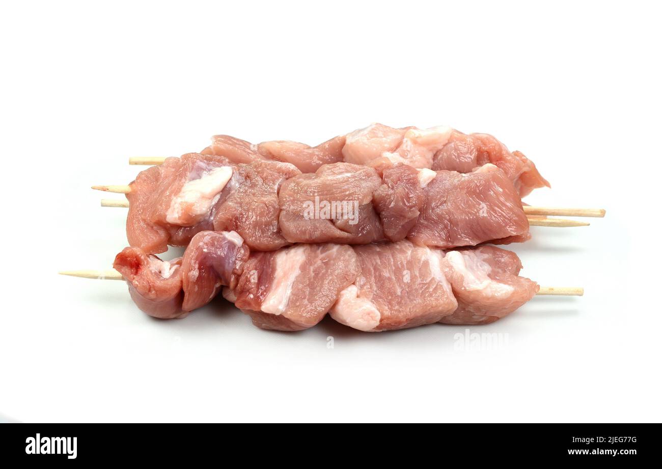 Raw Pork shish kebab isolated on white background Stock Photo - Alamy