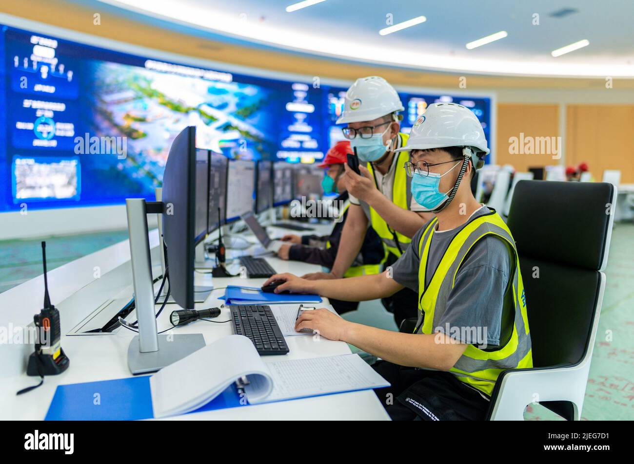 HOHHOT, CHINA - JUNE 27, 2022 - Technicians debug equipment in the ...