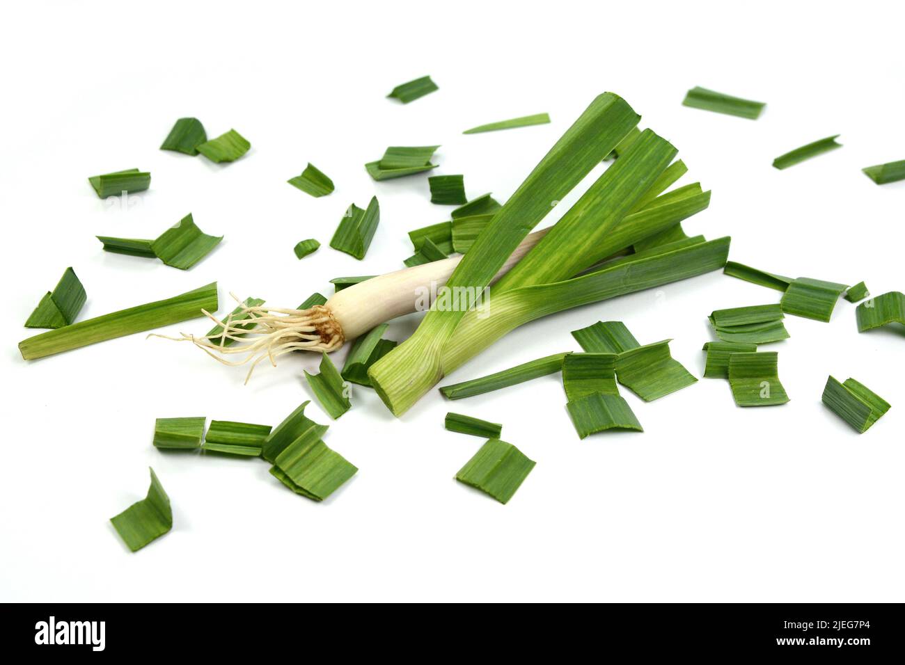 Fresh green garlic isolated on white background Stock Photo - Alamy