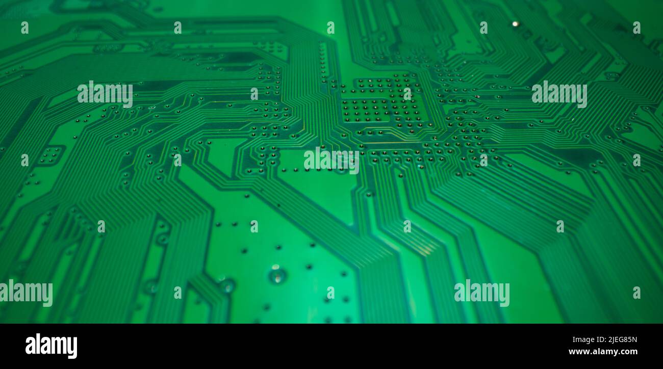 Technology background. High tech electronic circuit board background. Close-up macro electronic ...