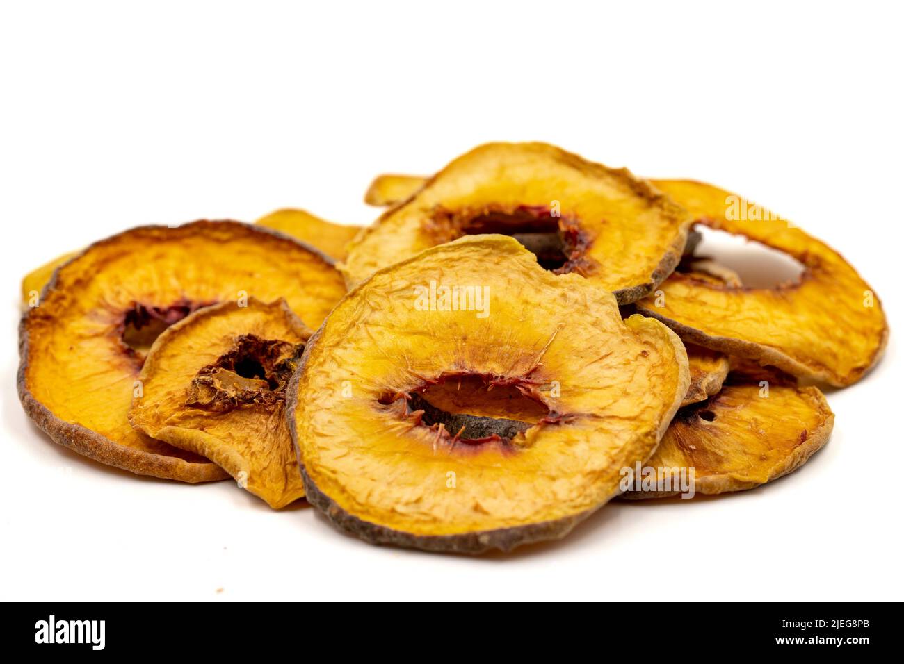 Dried peach slices. Sliced dry peach isolated on white background. Sun ...