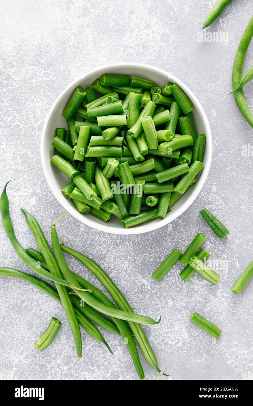 Fresh raw green beans cut in a bowl. French green beans Stock Photo - Alamy