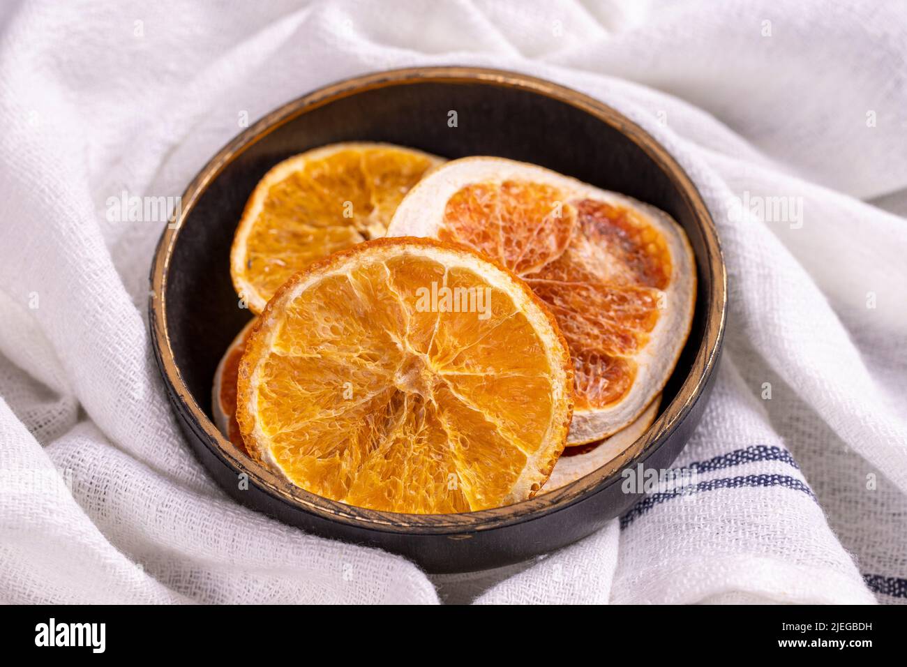 Dried orange slices. Sliced dried orange on a white background. Sun ...