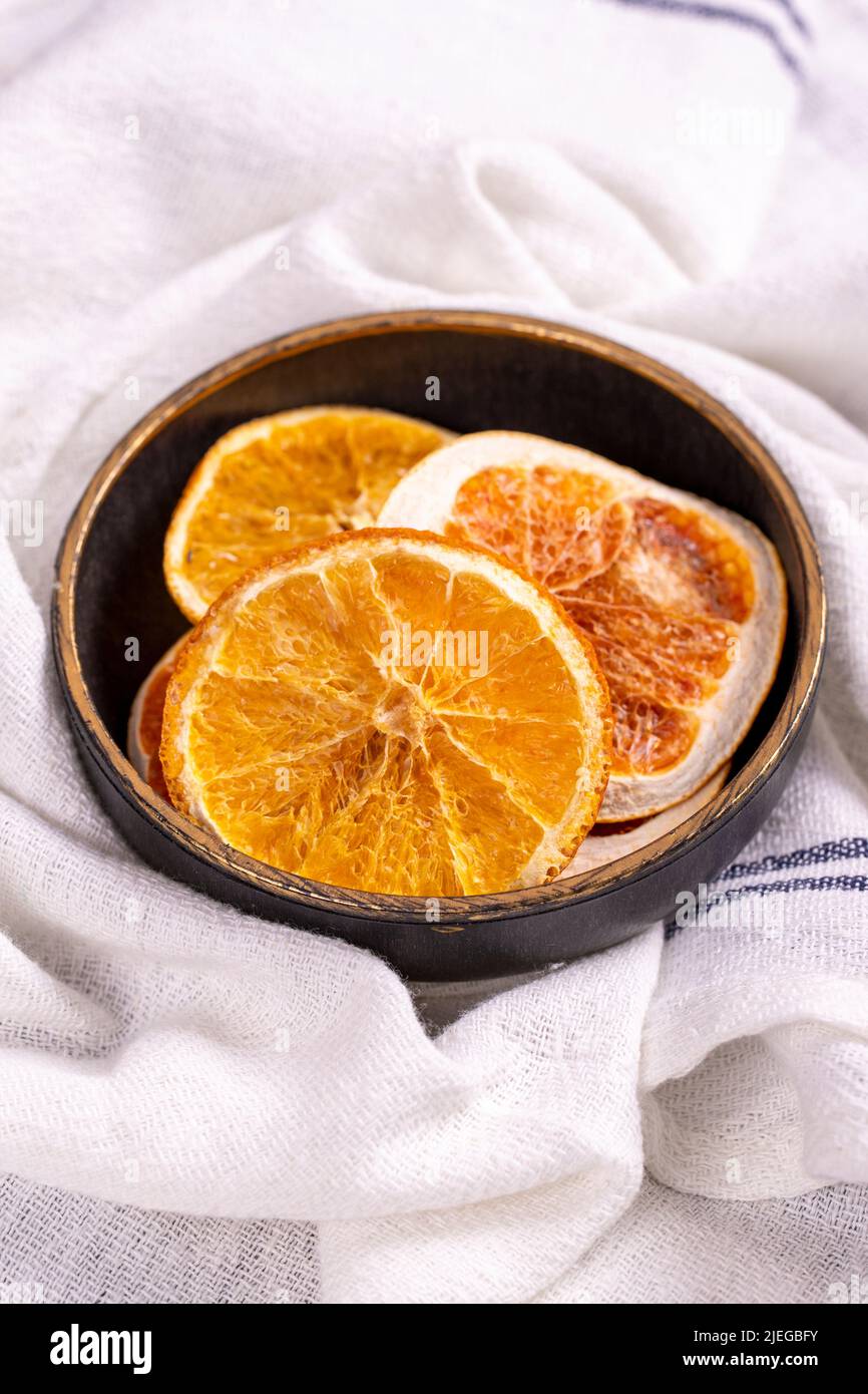 Dried orange slices. Sliced dried orange on a white background. Sun ...