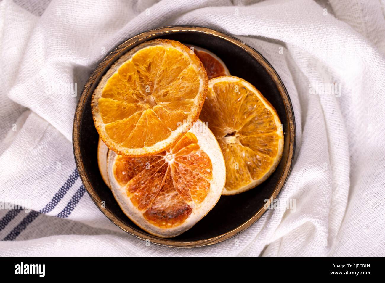 Dried orange slices. Sliced dried orange on a white background. Sun ...