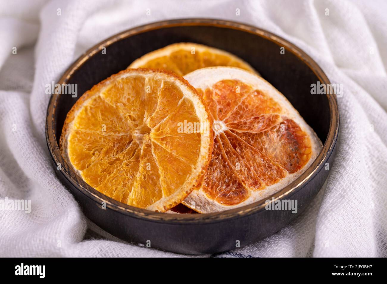 Dried orange slices. Sliced dried orange on a white background. Sun ...