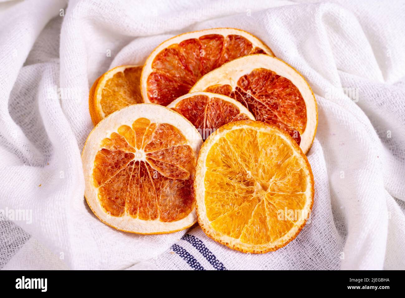 Dried orange slices. Sliced dried orange on a white background. Sun ...