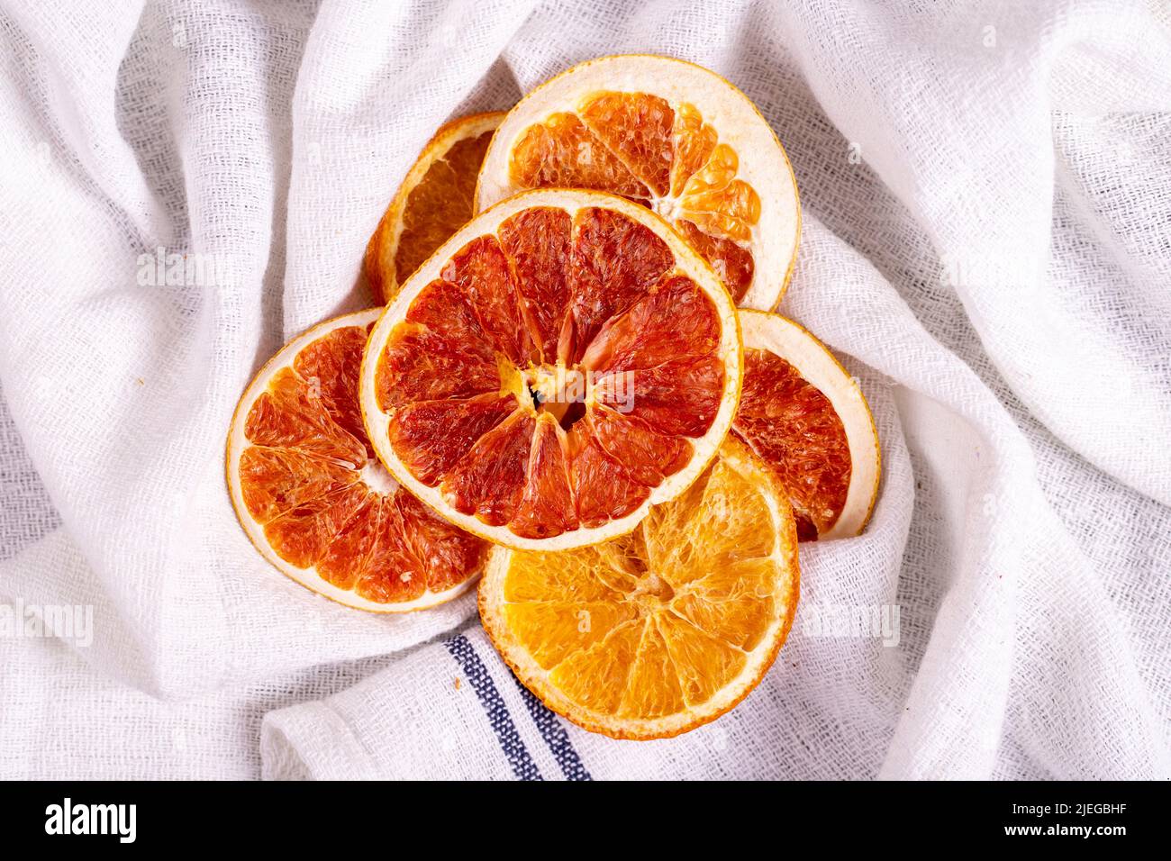 Dried orange slices. Sliced dried orange on a white background. Sun ...