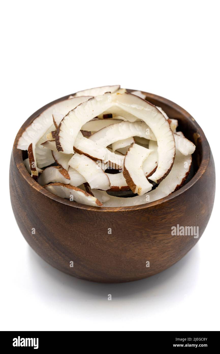 Dried coconut slices. Sliced dry coconut isolated on a white background ...