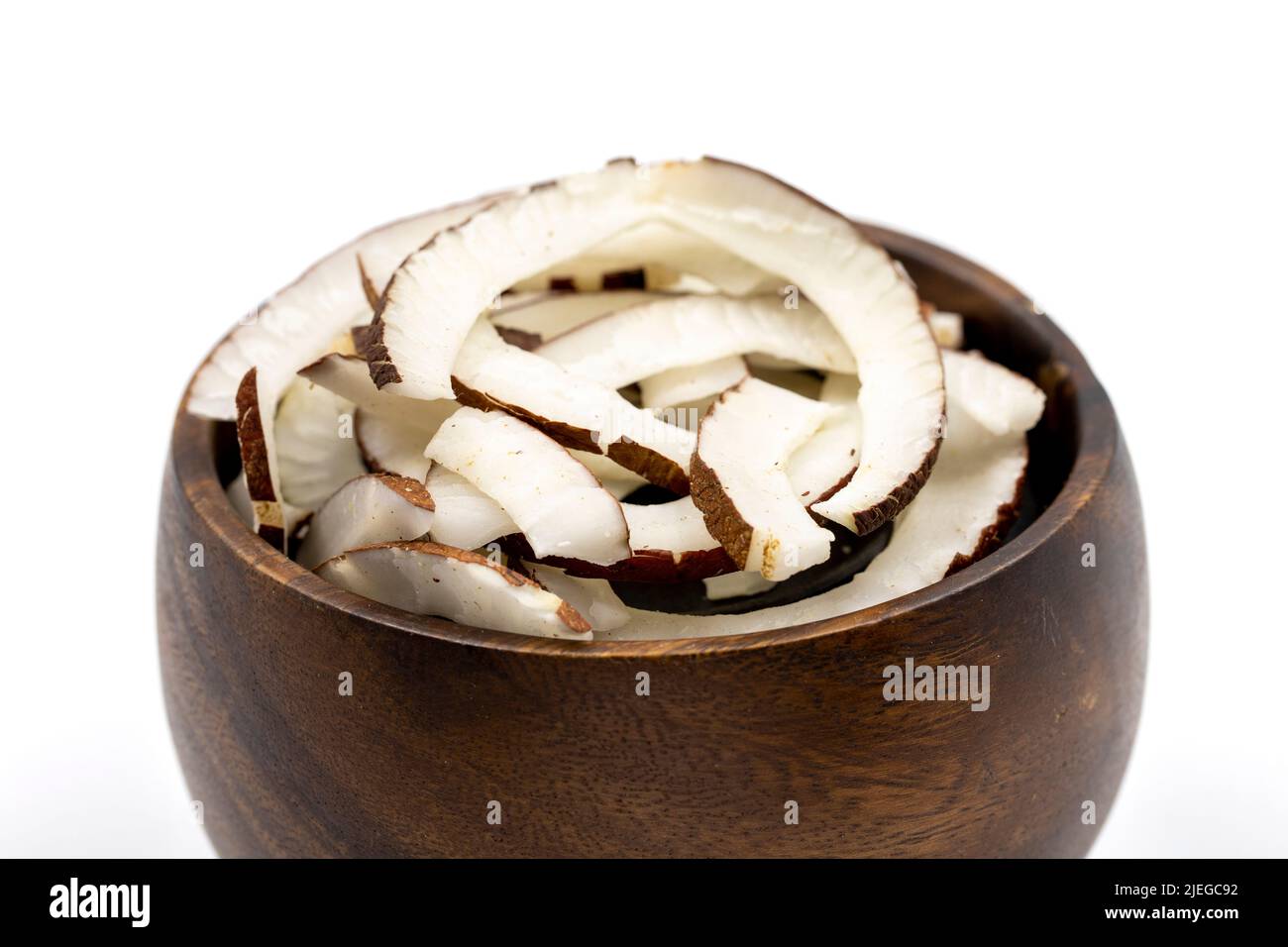 Dried coconut slices. Sliced dry coconut isolated on a white background ...