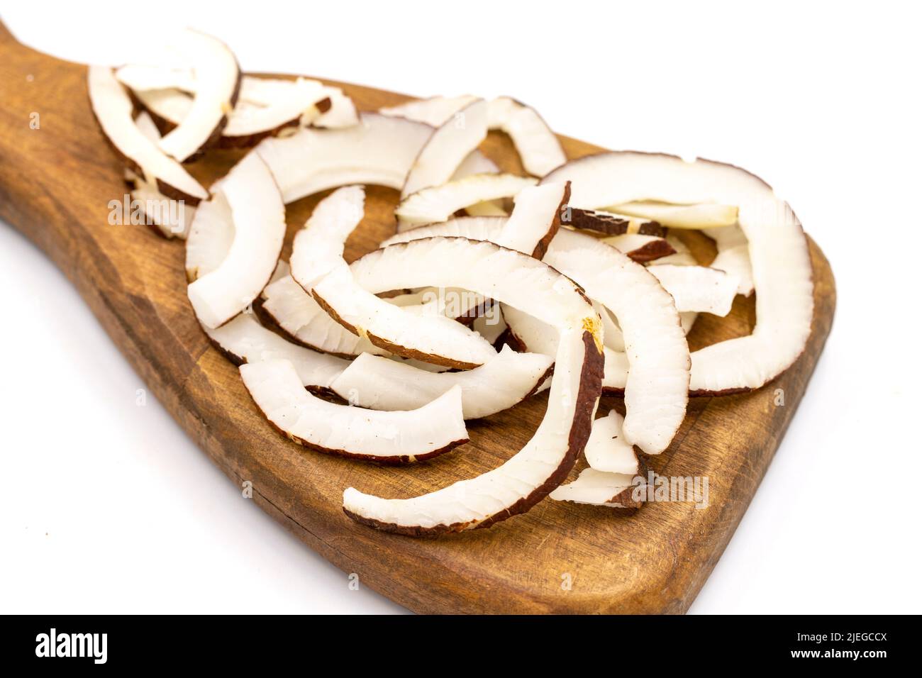 Dried coconut slices. Sliced dry coconut isolated on a white background ...