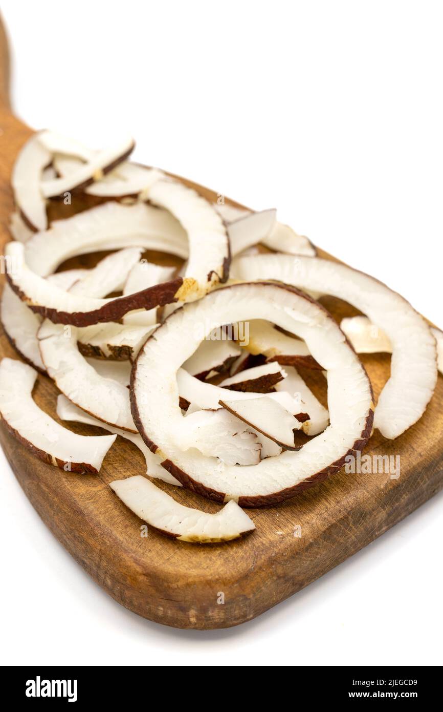 Dried coconut slices. Sliced dry coconut isolated on a white background ...