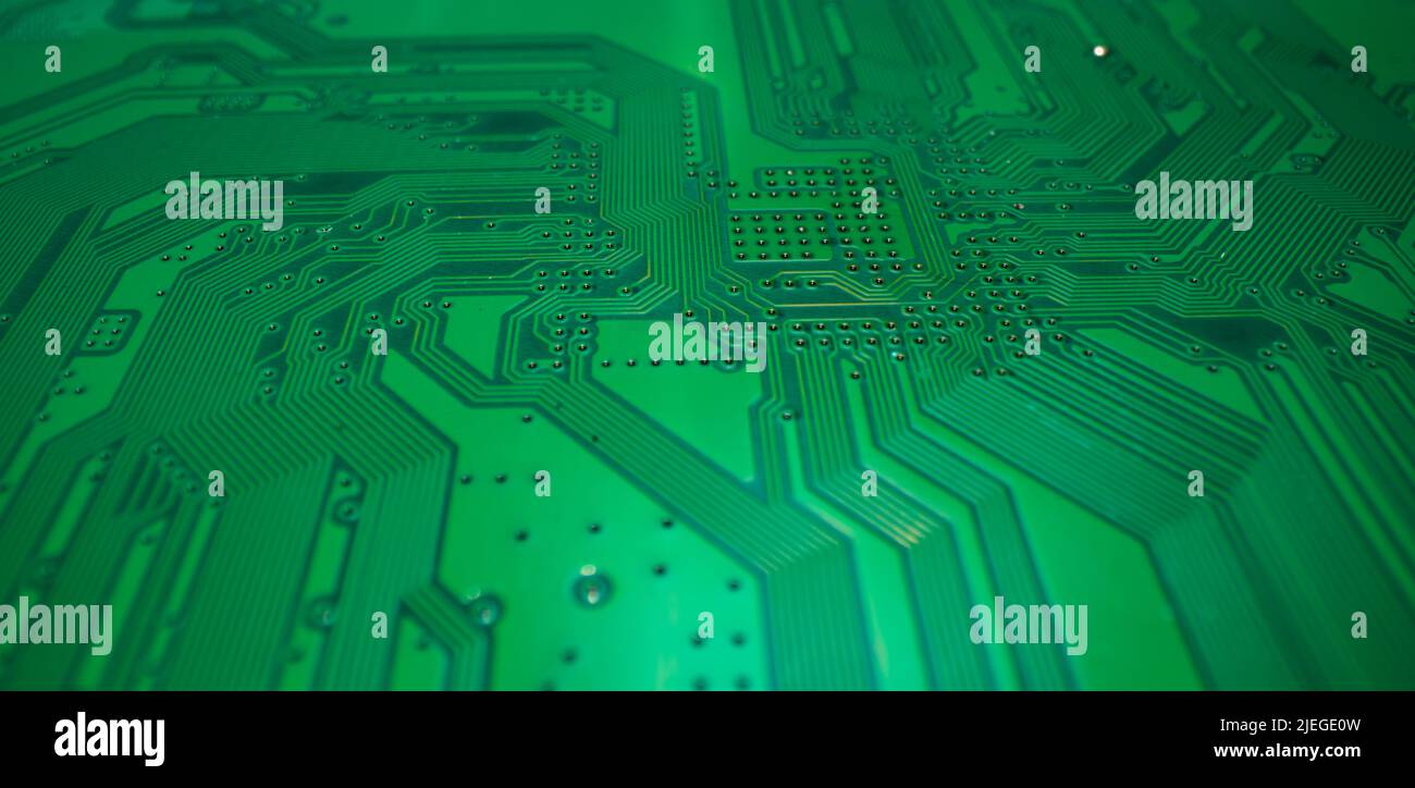 Technology background. High tech electronic circuit board background. Close-up macro electronic ...