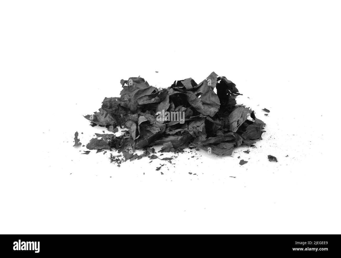 Burnt paper on a white background. The ashes of the paper. Charred ...