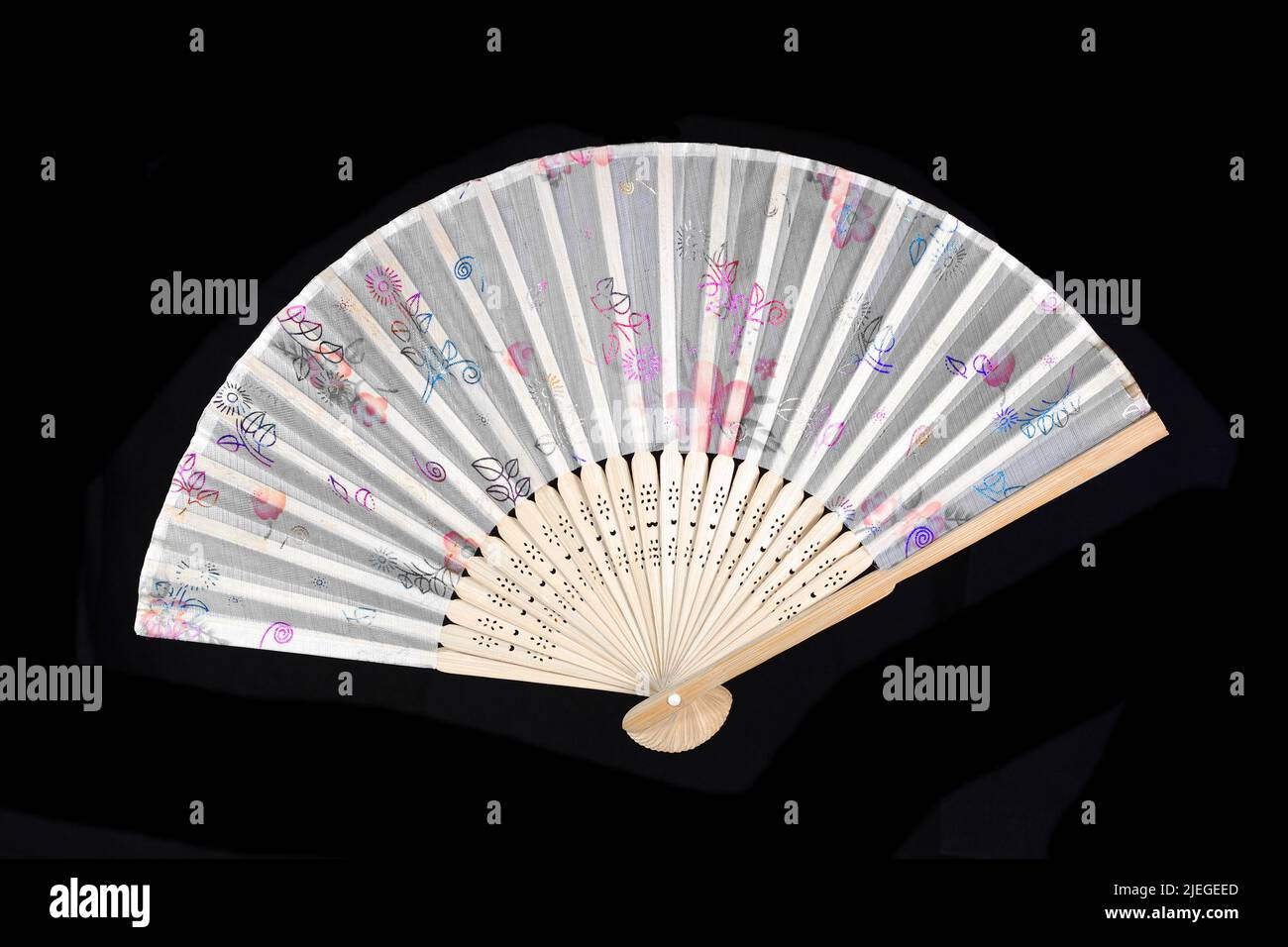 Hand fan isolated on black Stock Photo - Alamy