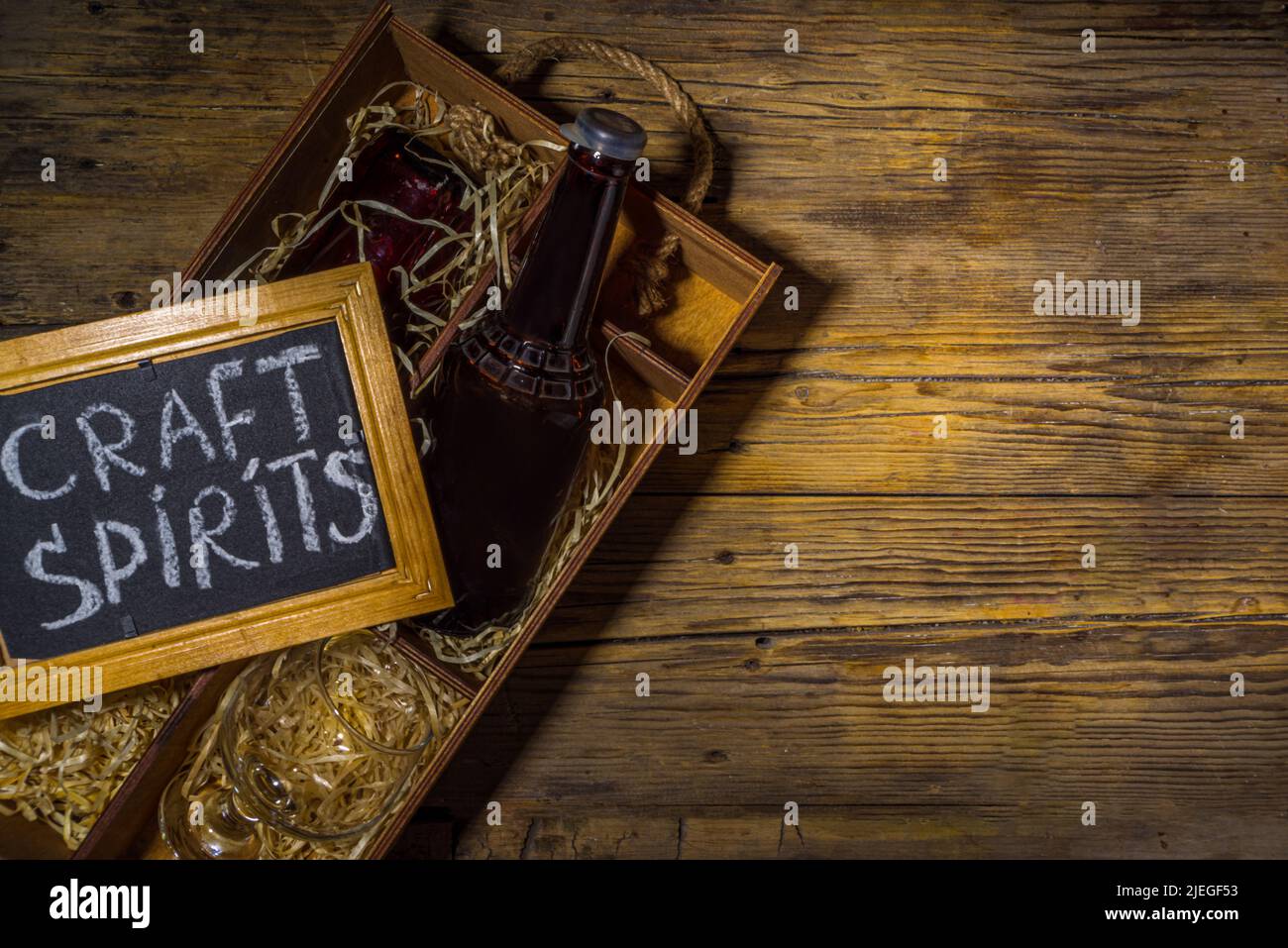 Craft spirit alcohol. Various bottles and glass with hand crafted hard ... Craft spirit alcohol. Various bottles and glass with hand crafted hard ...