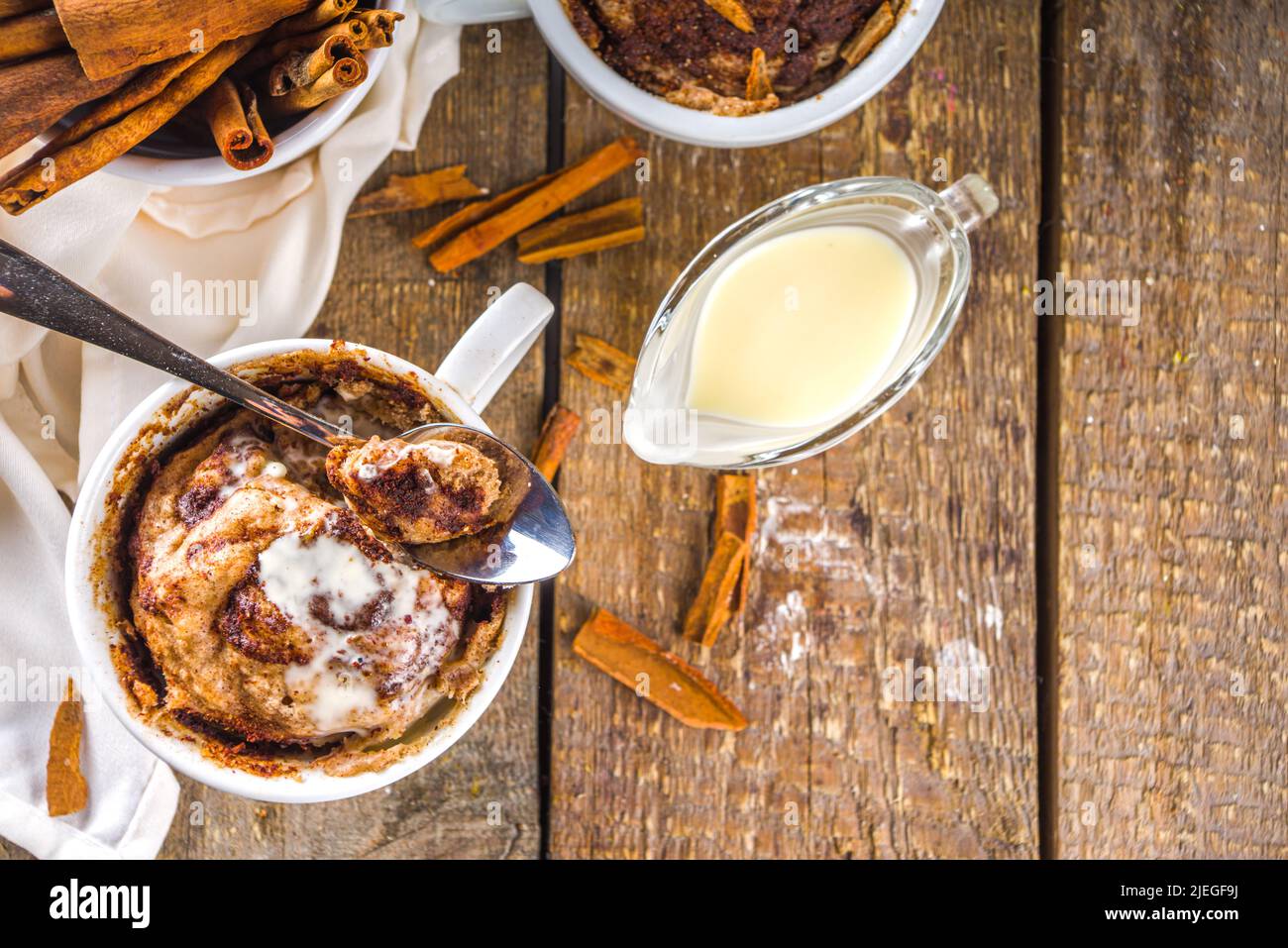 Cinnabon cake in mug. Fast simple microwave dessert idea, background ...