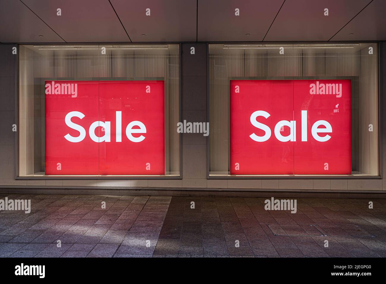 27 June 2022: Sale sign on shop window Stock Photo - Alamy