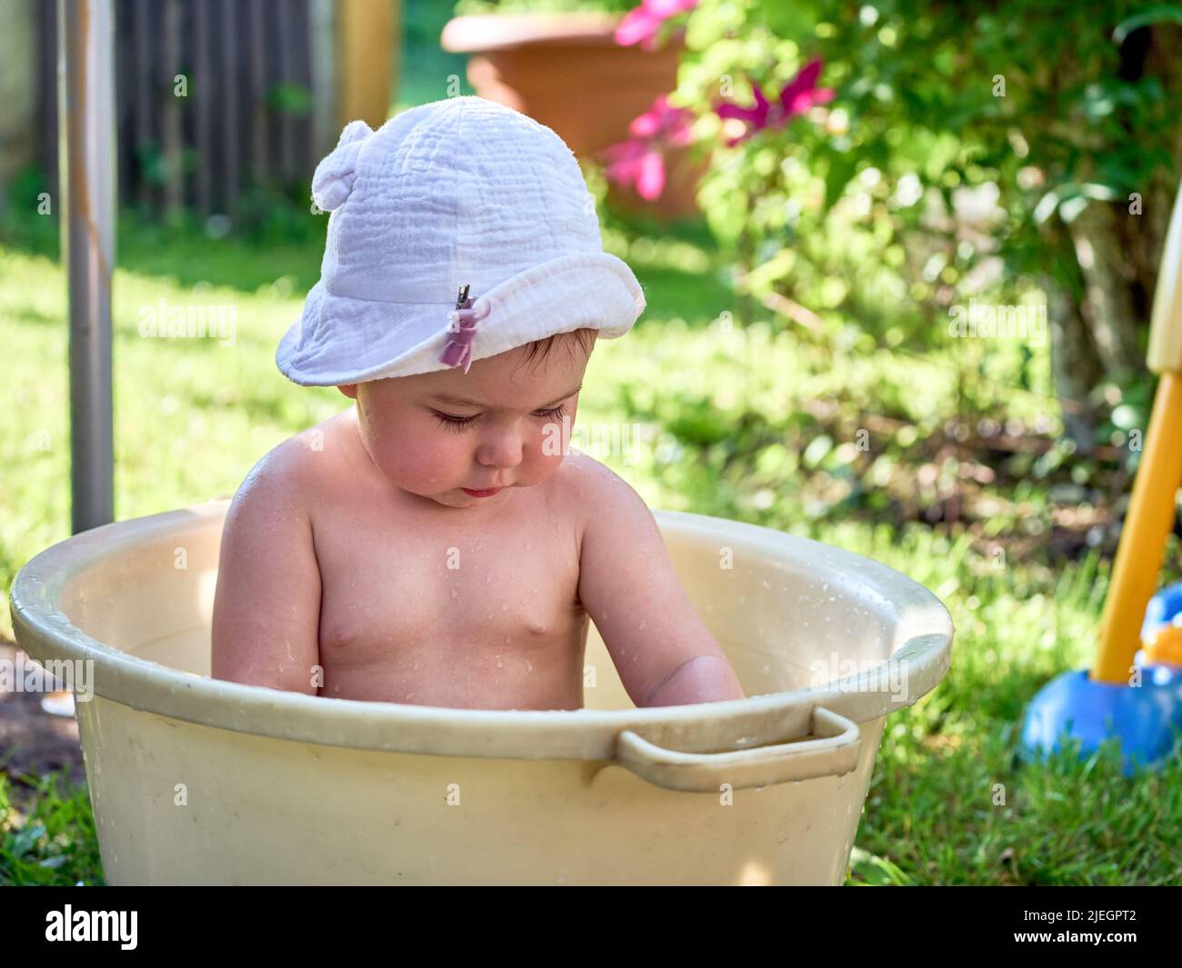 Cute baby in water hi-res stock photography and images - Alamy