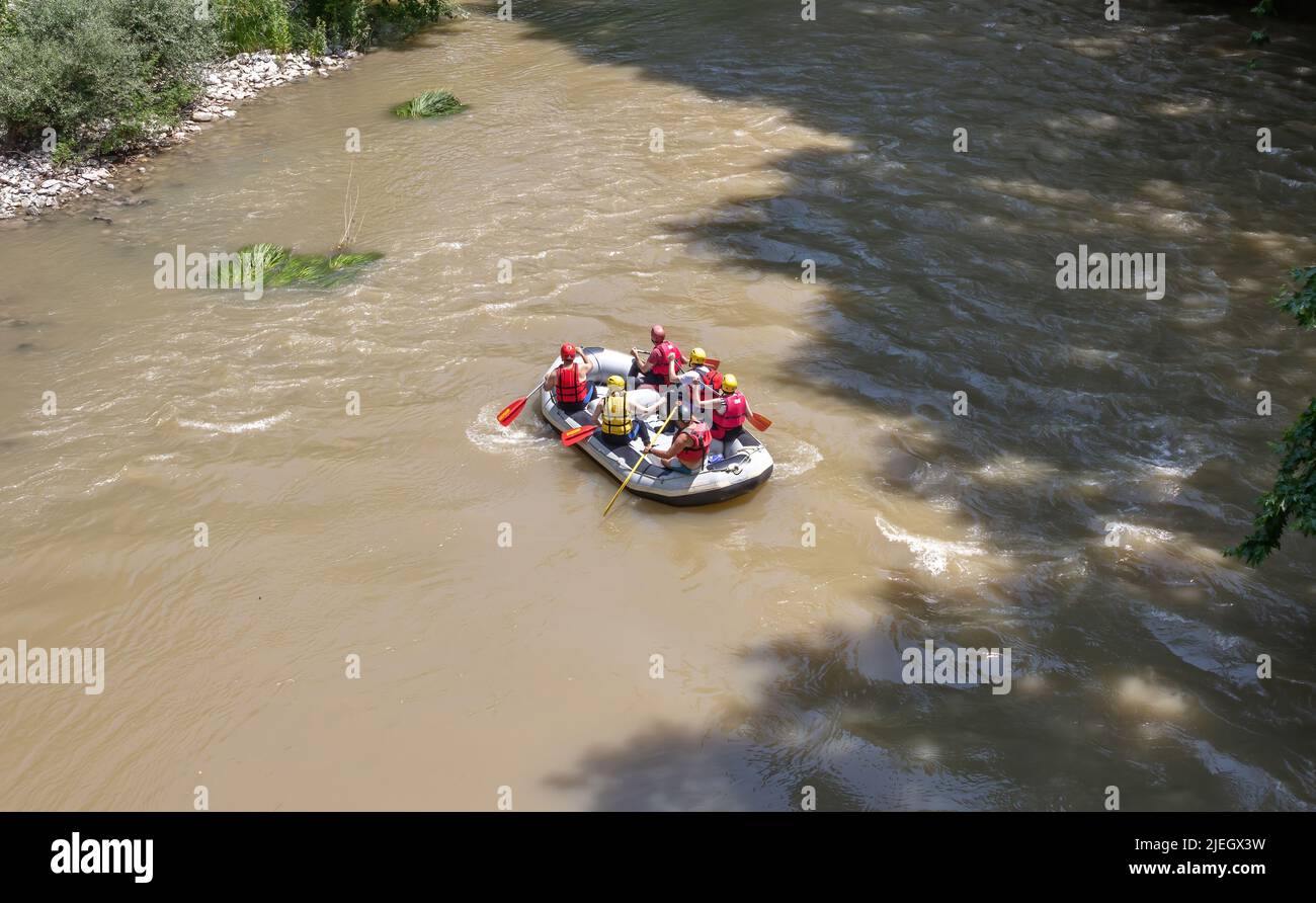 River rafting in Greece view from above. People in safety gear on a ...