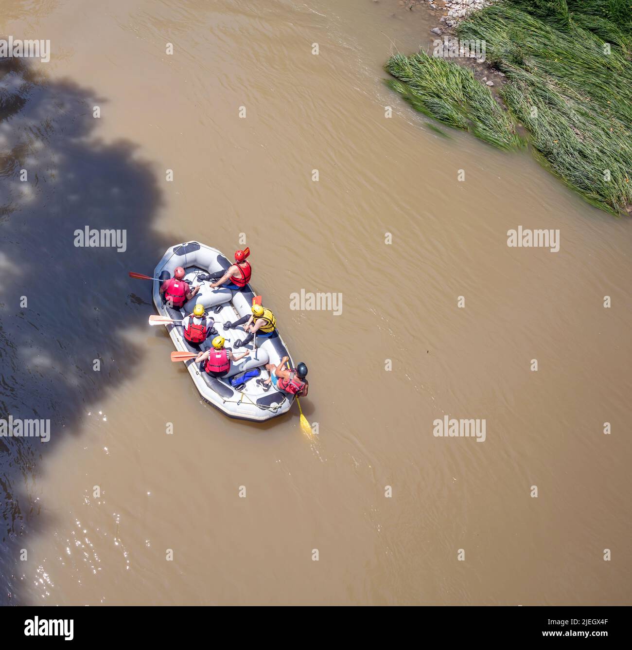 River rafting at Vale of Tempi, Thessaly, Greece. Group of tourists in ...