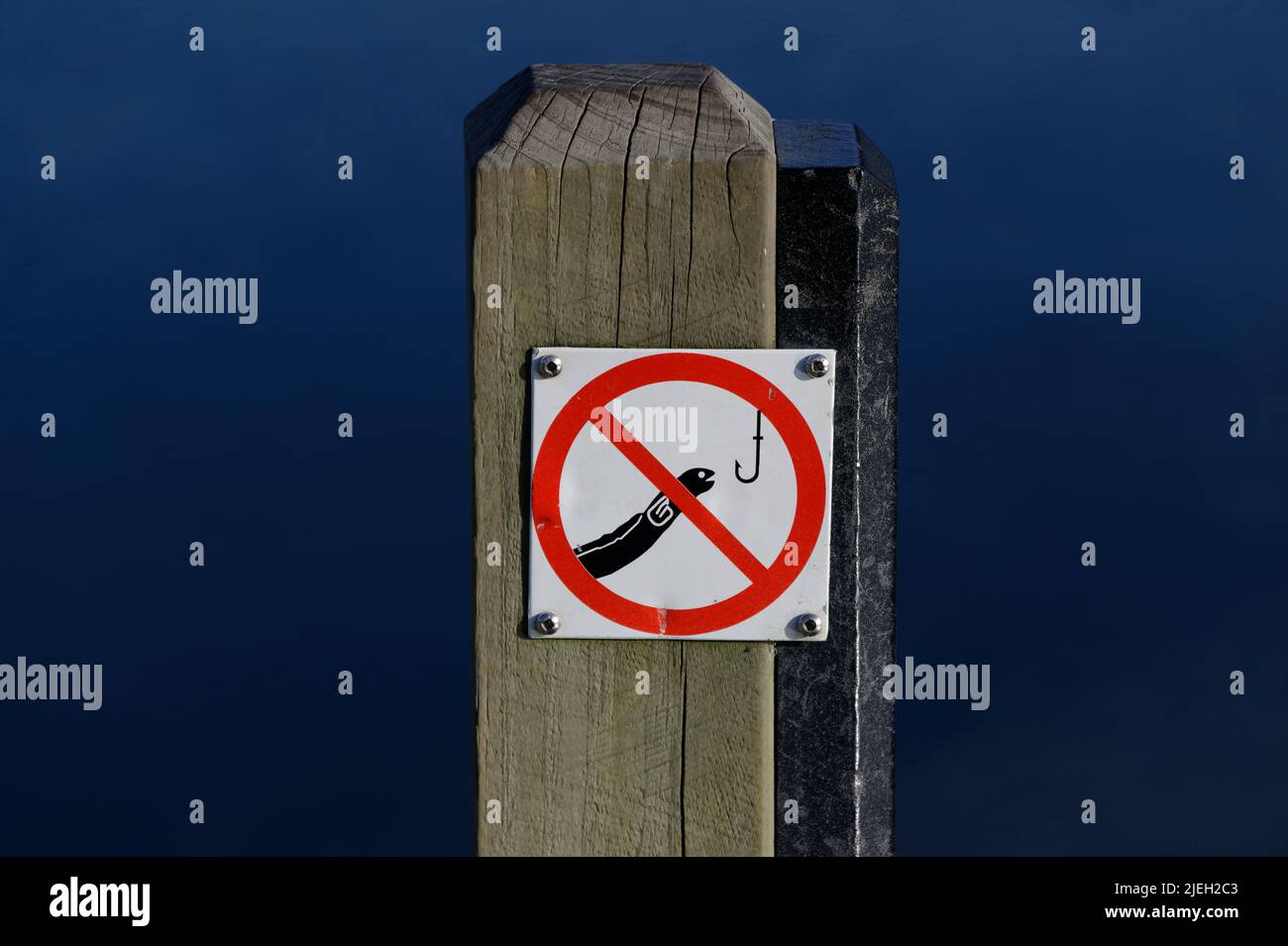 A sign telling people that fishing for eels is not permitted at Lake ...