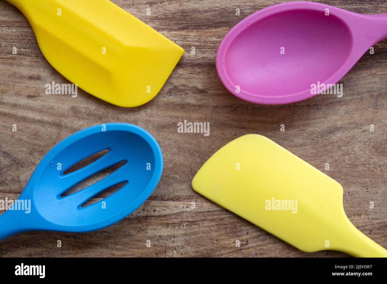 detail of colored kitchen dippers Stock Photo - Alamy