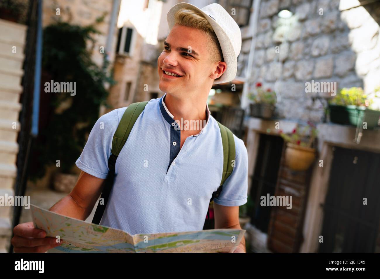 Portrait young tourist map hi-res stock photography and images - Alamy