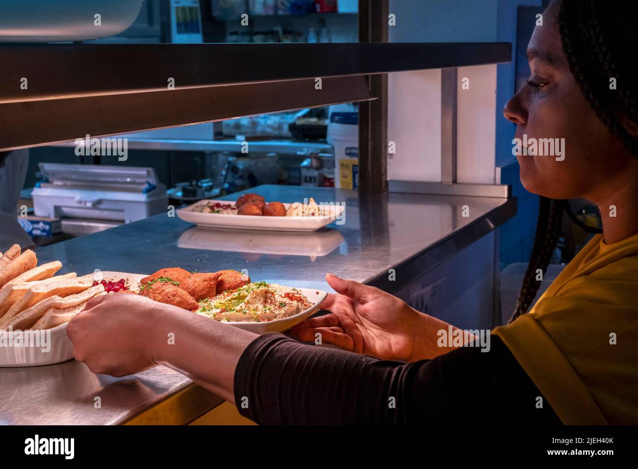 Dishes of Hummus, Baba Ghanouj and Kibbeh food at the pass collected by ...