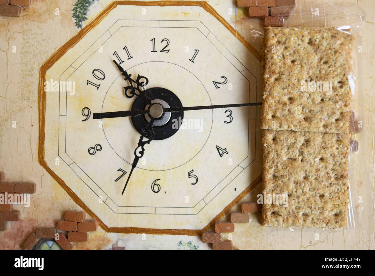 concept of breack time with a snack with crackers Stock Photo - Alamy