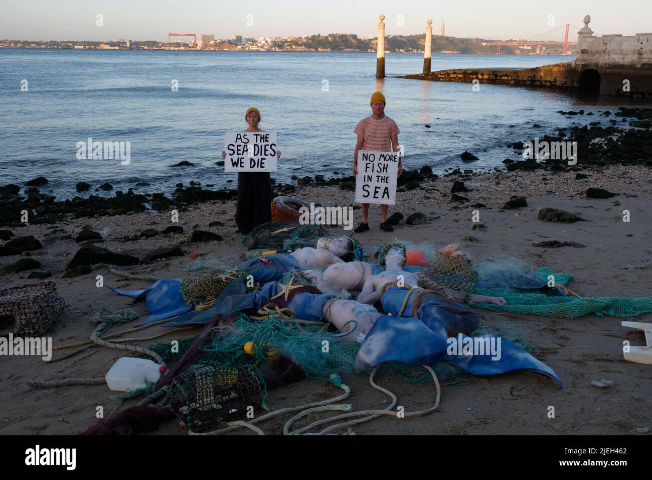 Lisbon, Portugal. 27th JUN 2022. Members of Ocean Rebellion perform a ...
