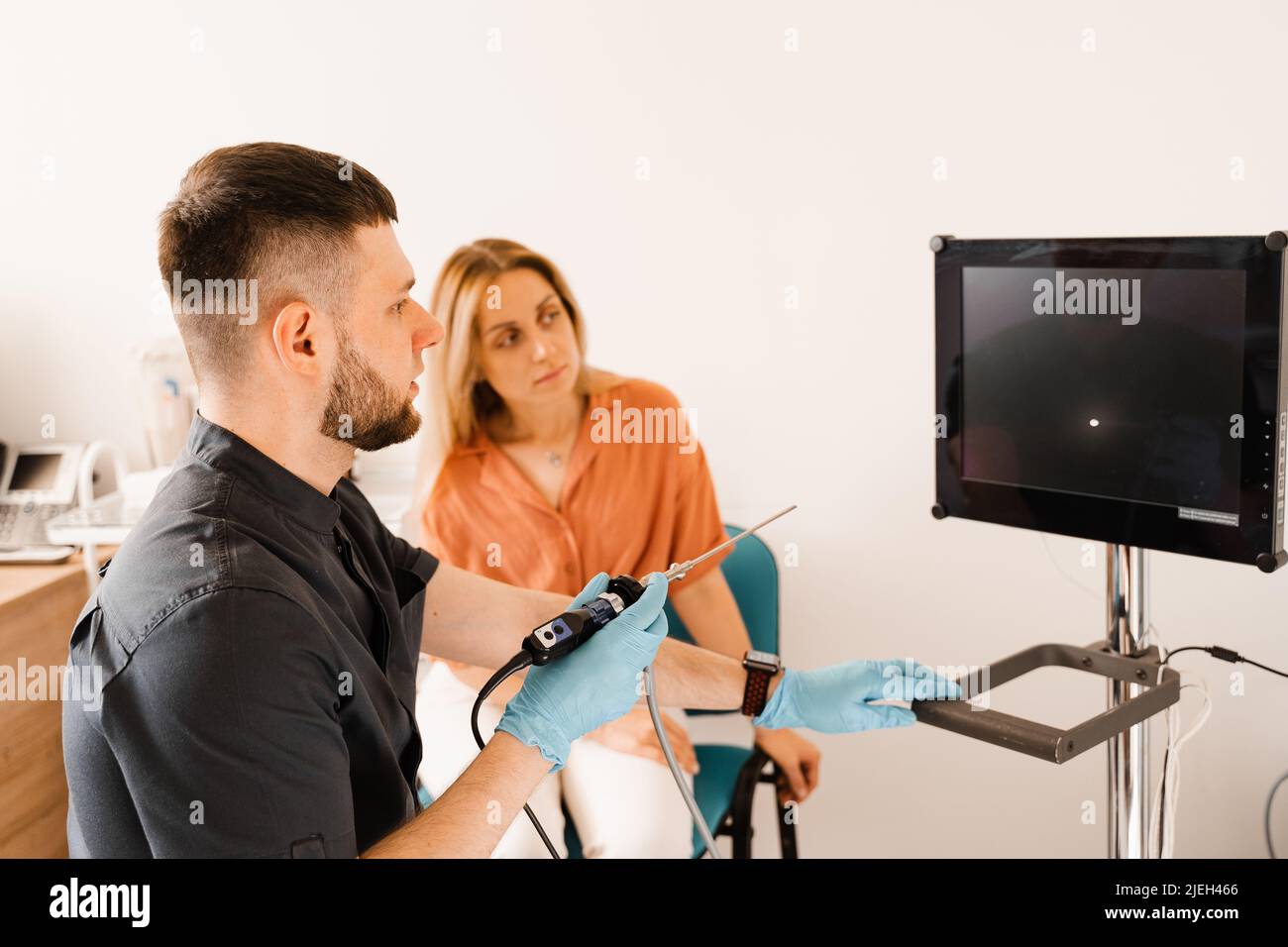 Doctor otolaryngologist with rhinoscope for endoscopy. Consultation ...