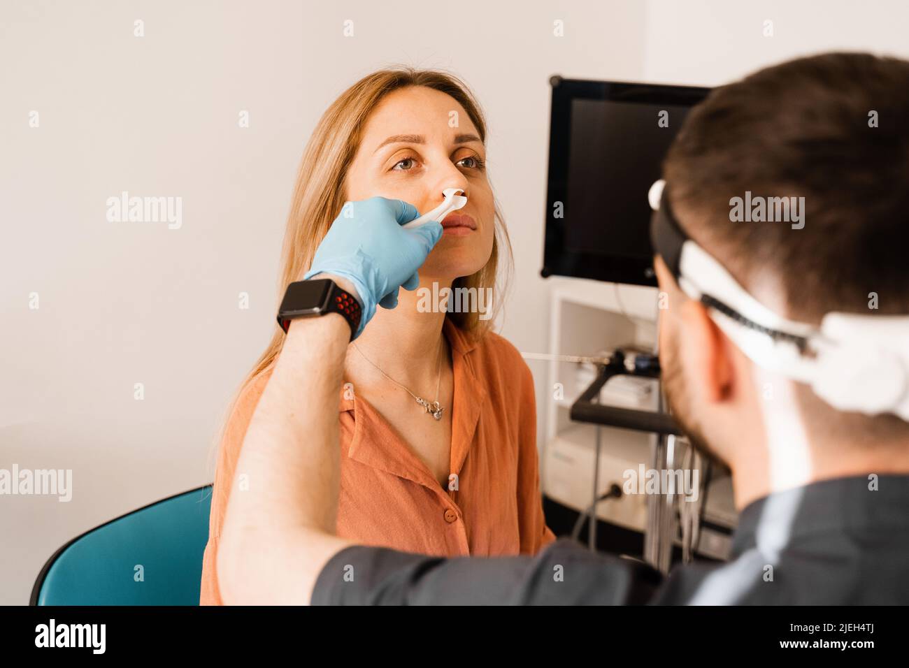 Rhinoscopy of woman nose. Consultation with doctor. Otolaryngologist ...