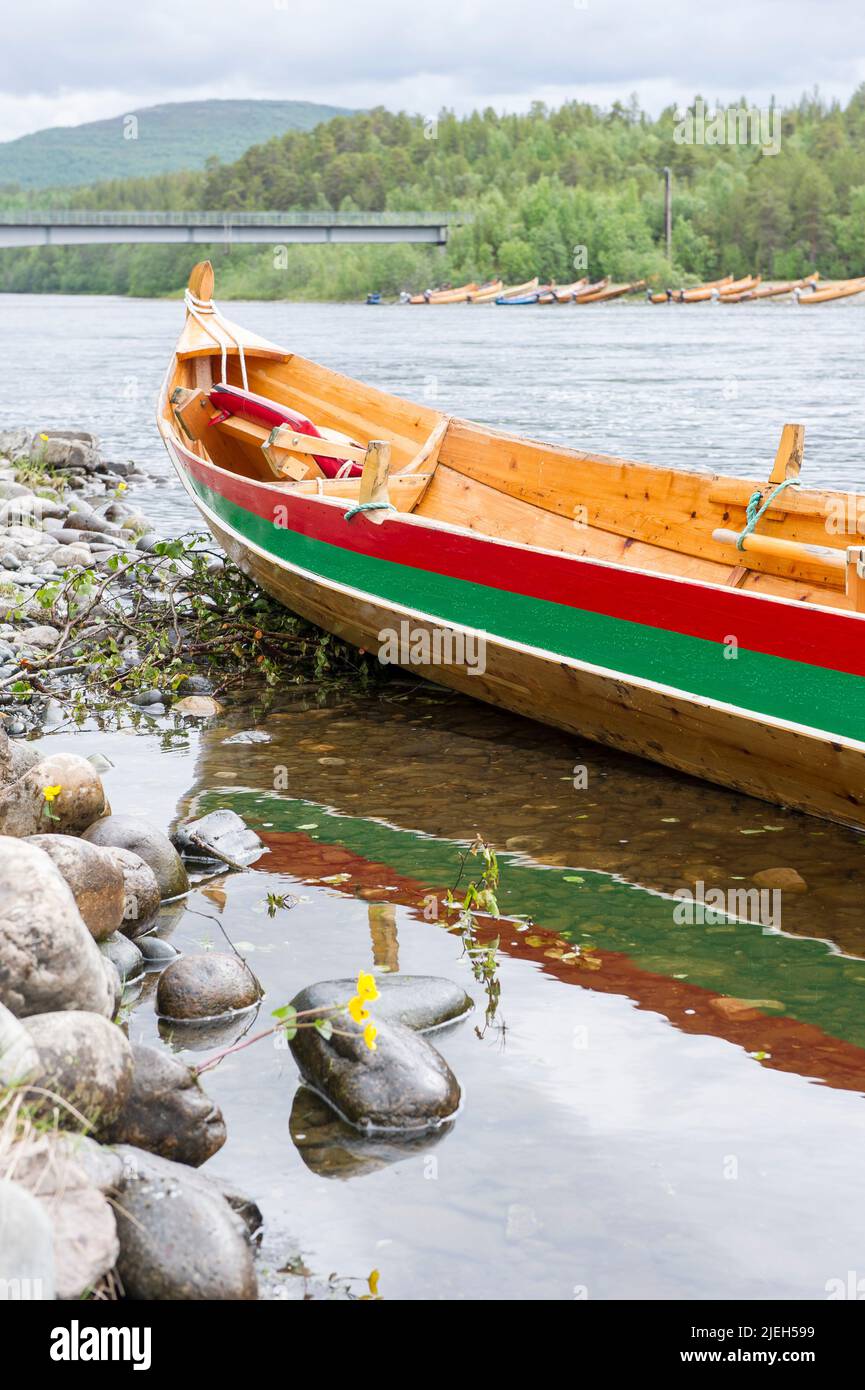 Wooden canoes to explore the Norwegian rivers Stock Photo - Alamy