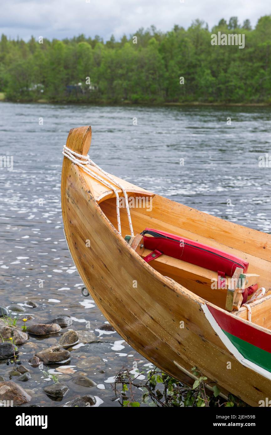 Wooden canoes to explore the Norwegian rivers Stock Photo - Alamy