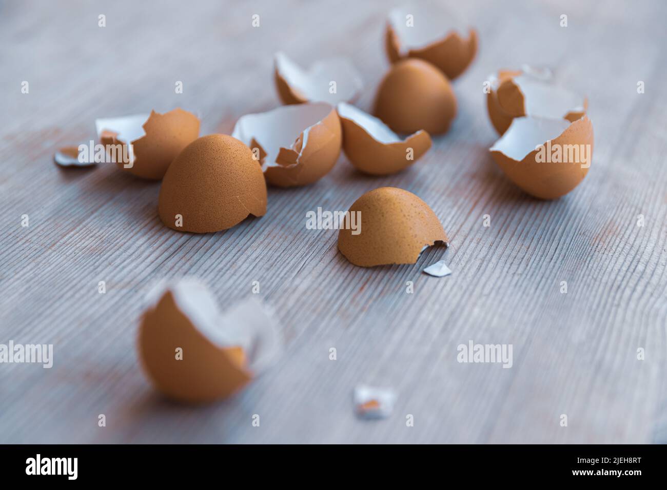 Closeup Photo of a Egg Shells over Wood Table Background. Waste ...