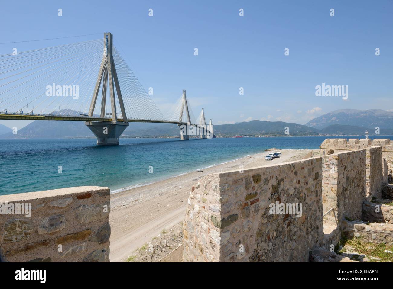 The suspended bridge and fort of Rio near Patras on Greece Stock Photo ...