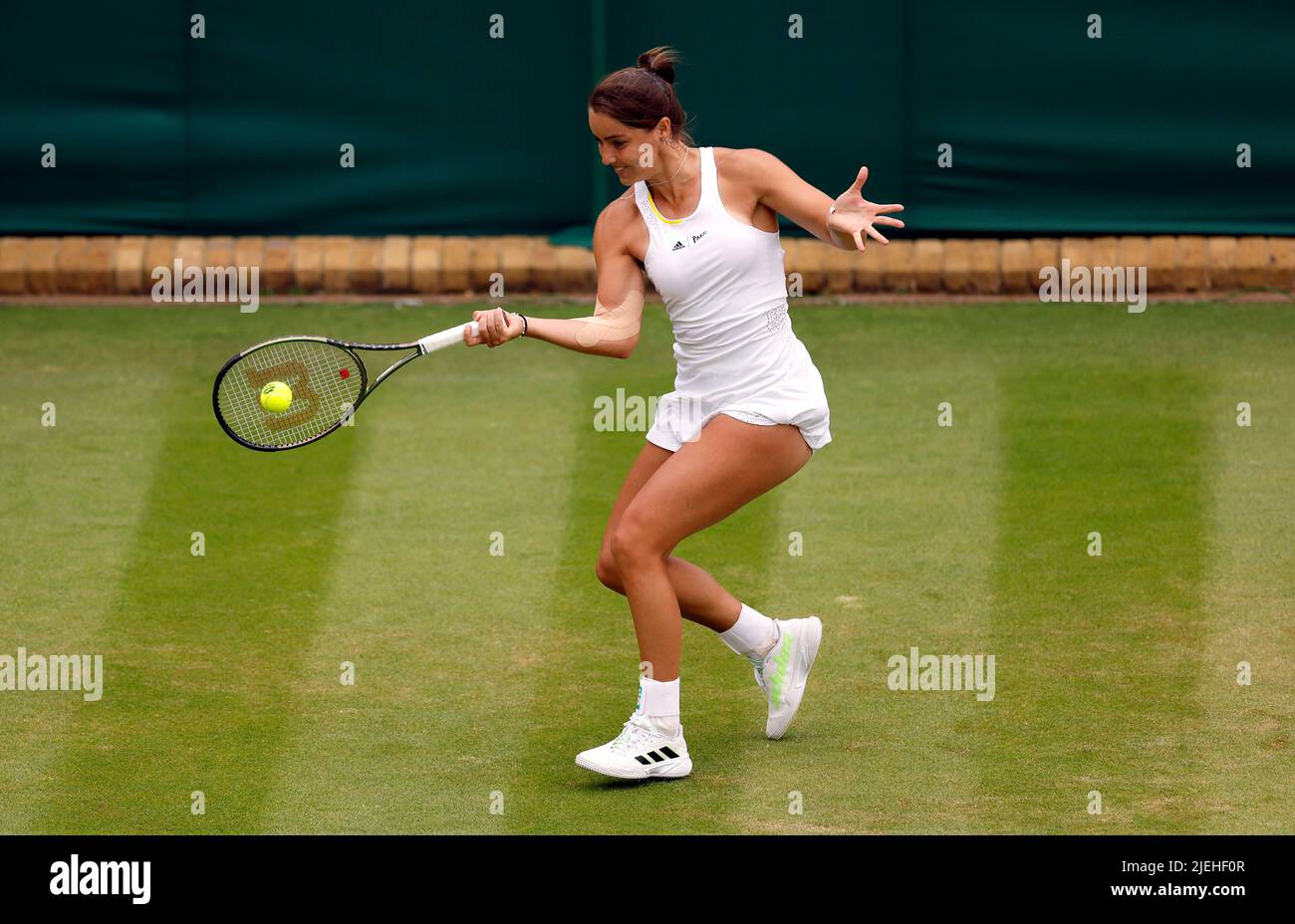 Jodie Burrage in action during her Ladies' singles first round match ...