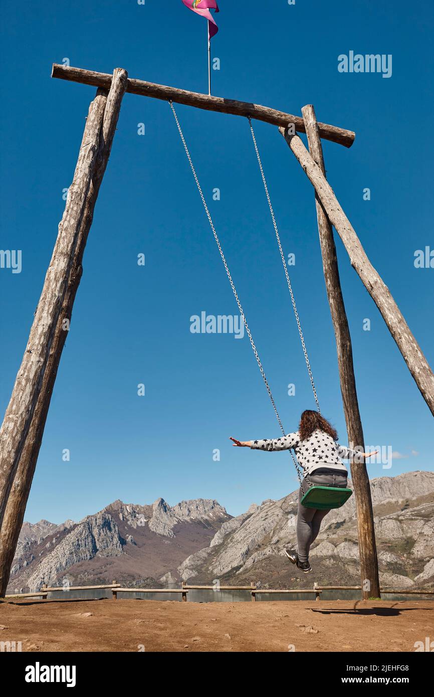 Huge swing surrounded by mountains in Riano village. Spain Stock Photo ...