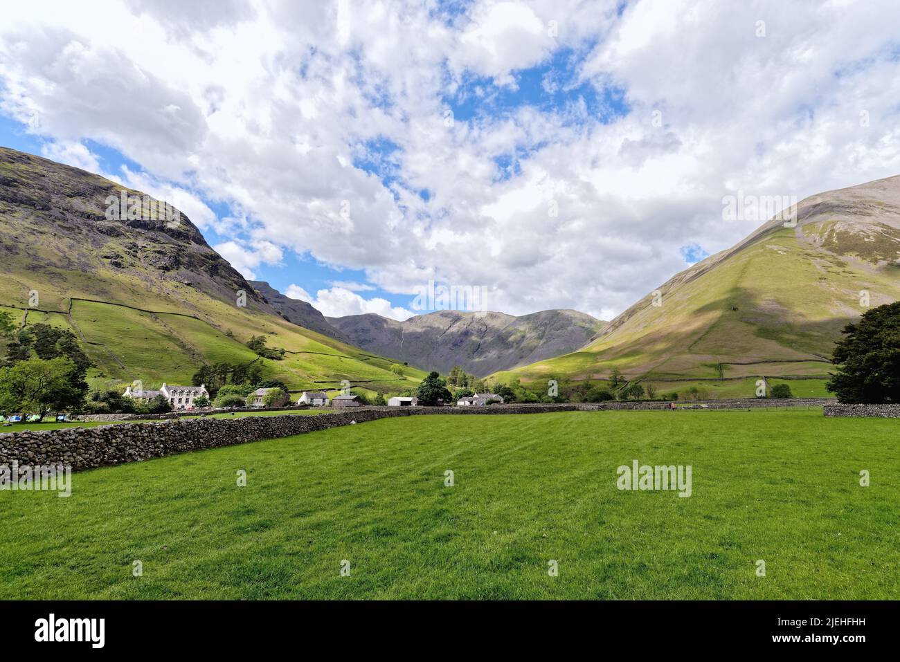 The remote countryside at Wasdale Head with a farmhouse surrounded by ...