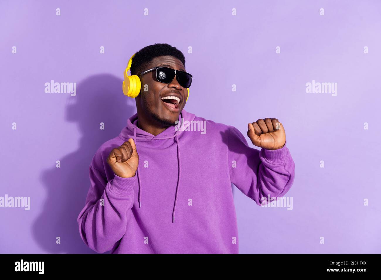 Portrait of overjoyed positive man chilling have good mood favorite ...