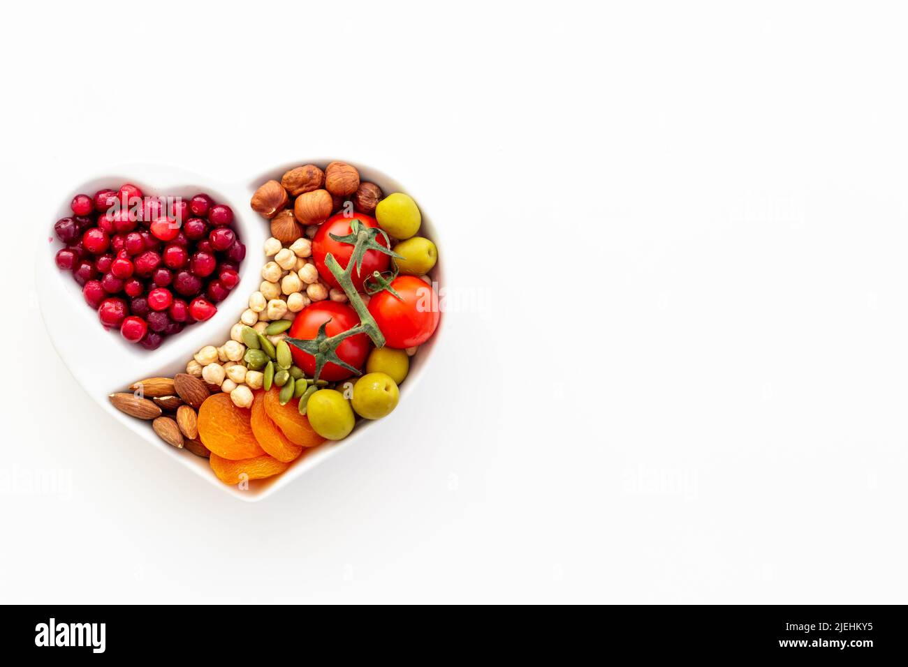 Healthy food in heart shaped dish. Healthy lifestyle and nutrition ...