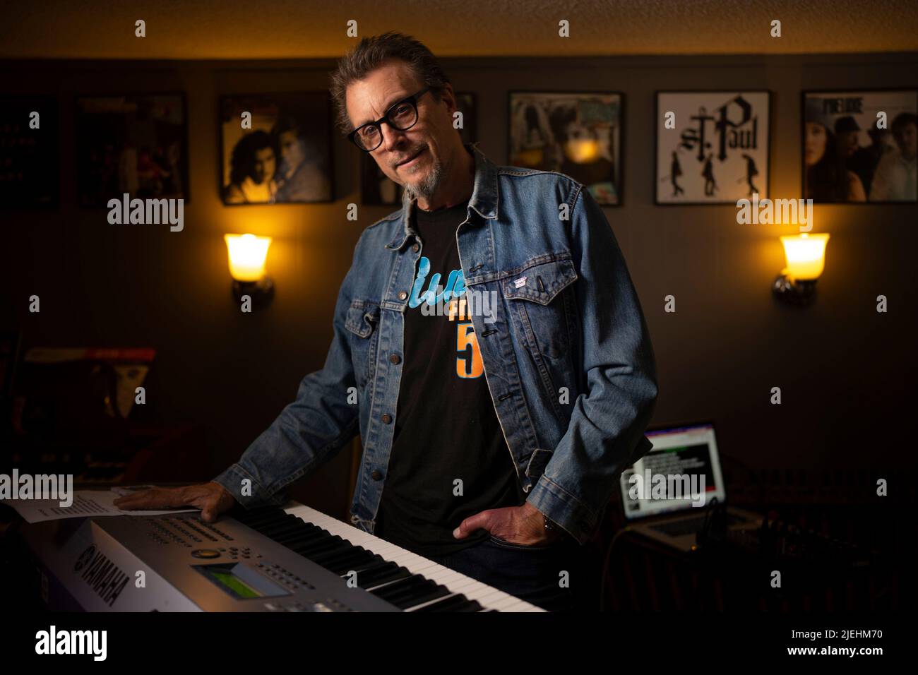 Musician Paul Peterson stands in the basement studio of his house in ...