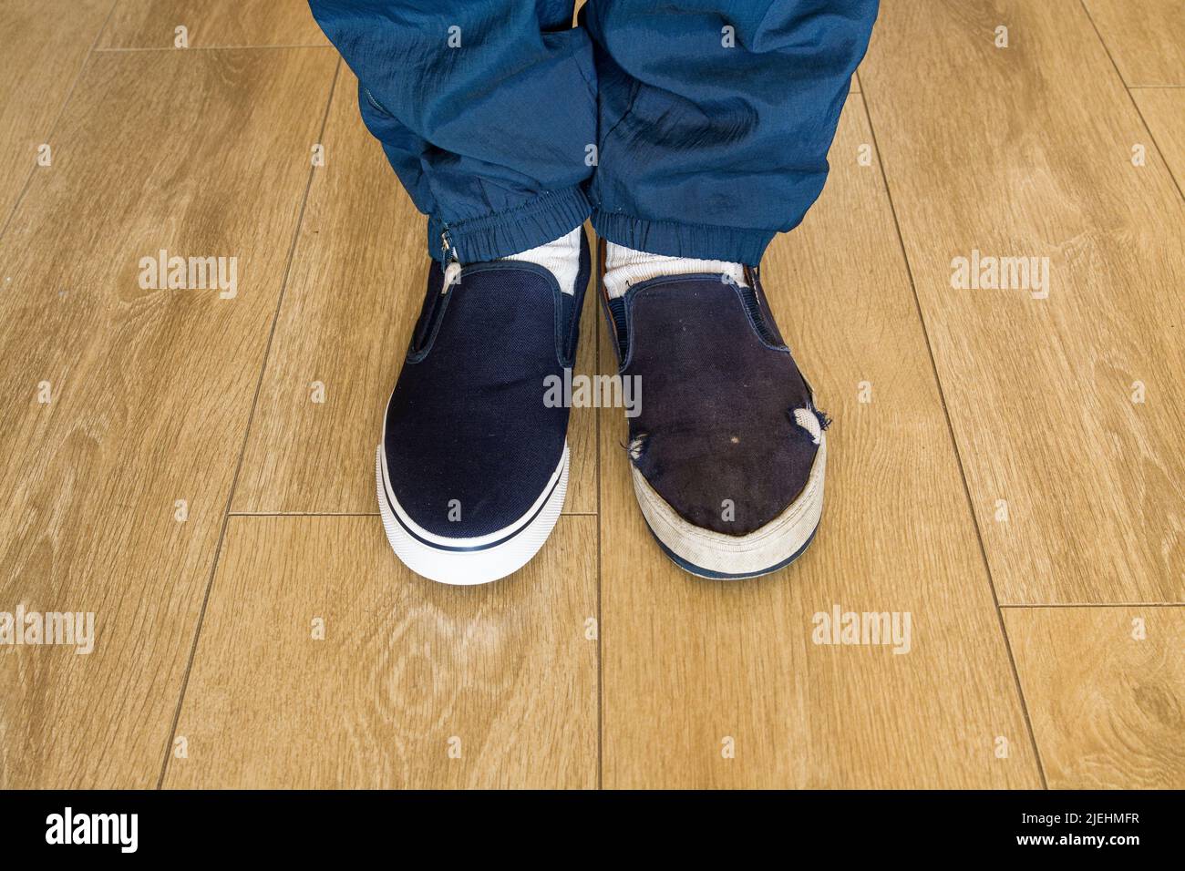 Stark comparison - blue and white shoes - new versus old and worn ...
