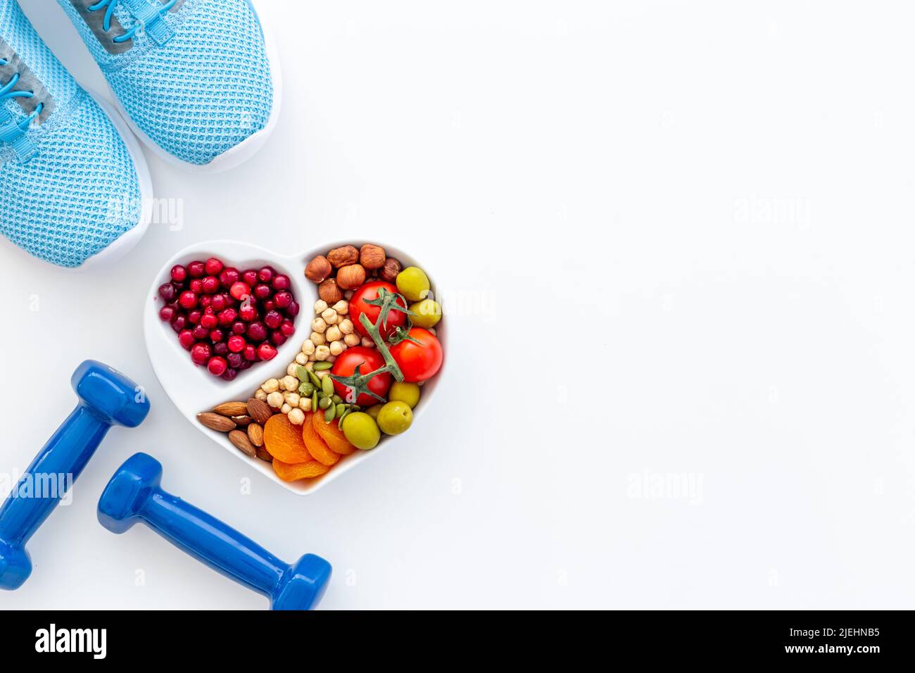 Healthy food in heart shaped dish. Healthy lifestyle and nutrition ...
