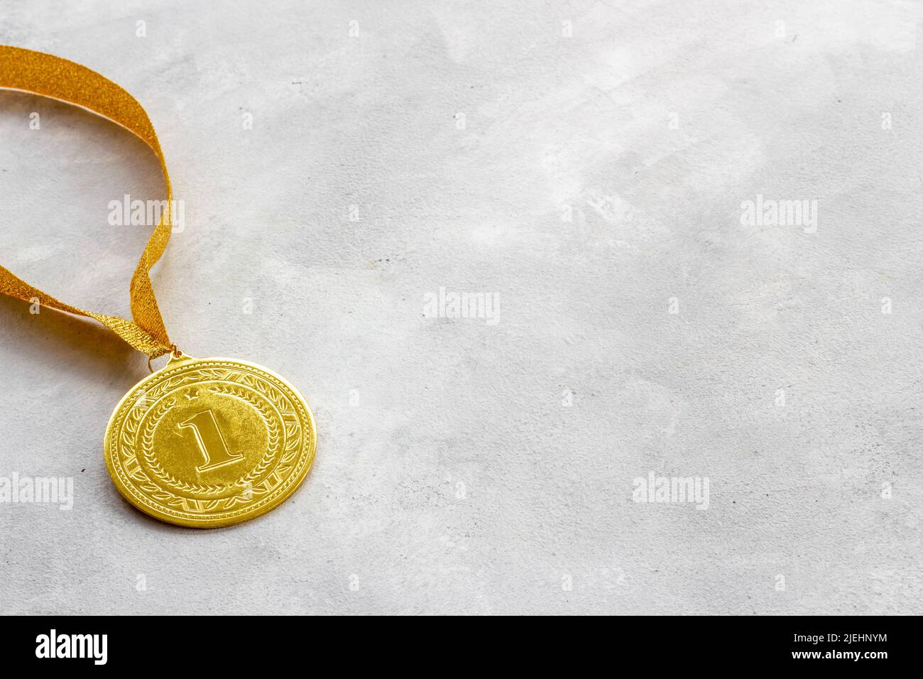 Winner and success concept with gold medal first place and ribbon Stock ...